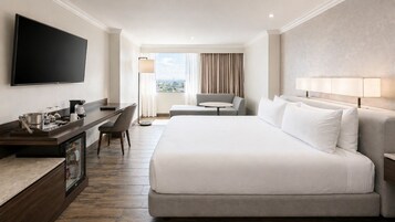 1 quarto, minibar, cofre com capacidade para portátil 