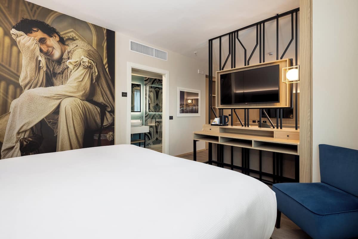 Suite, 1 cama king-size e sofá-cama | Cofre no quarto, secretária