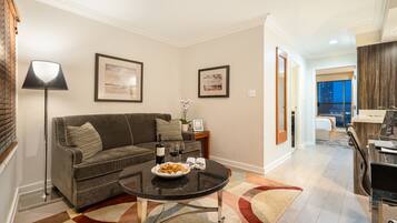 TV de ecrã plano, base para iPod, filmes pagos