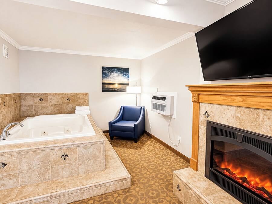 Suíte executiva, 1 cama King, para não fumantes, lareira | Comodidades do quarto