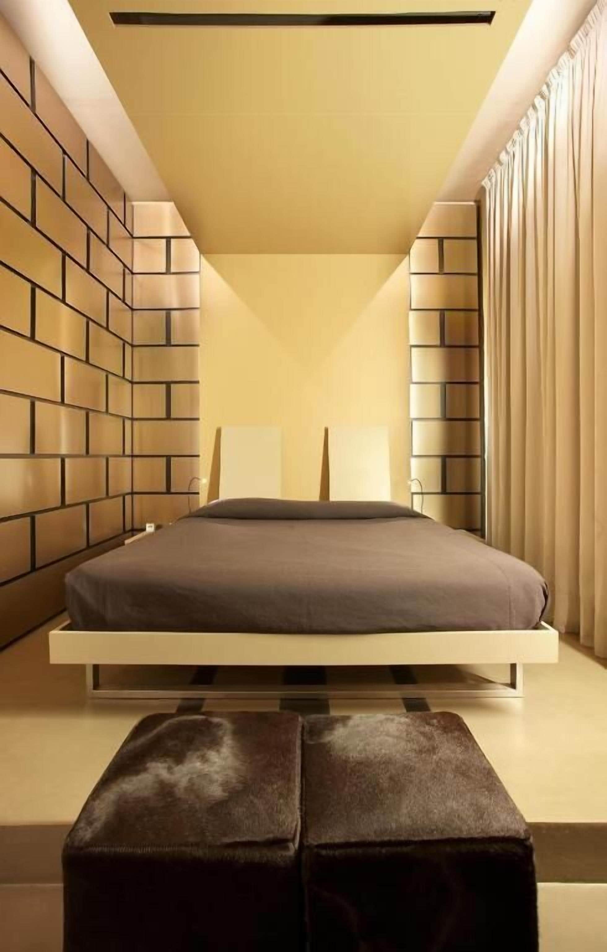 Quarto Triplo | Edredões de penas, minibar, cofre no quarto, secretária 