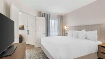 Suíte, várias camas (Two Bedroom King and Two Doubles) | 2 quartos, roupas de cama de algodão egípcio, roupas de cama premium