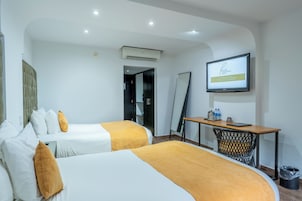 Quarto standard, vista para o jardim | Roupas de cama premium, edredons de pluma, cofres nos quartos