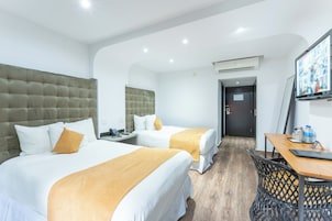 Quarto standard, vista para o jardim | Roupas de cama premium, edredons de pluma, cofres nos quartos