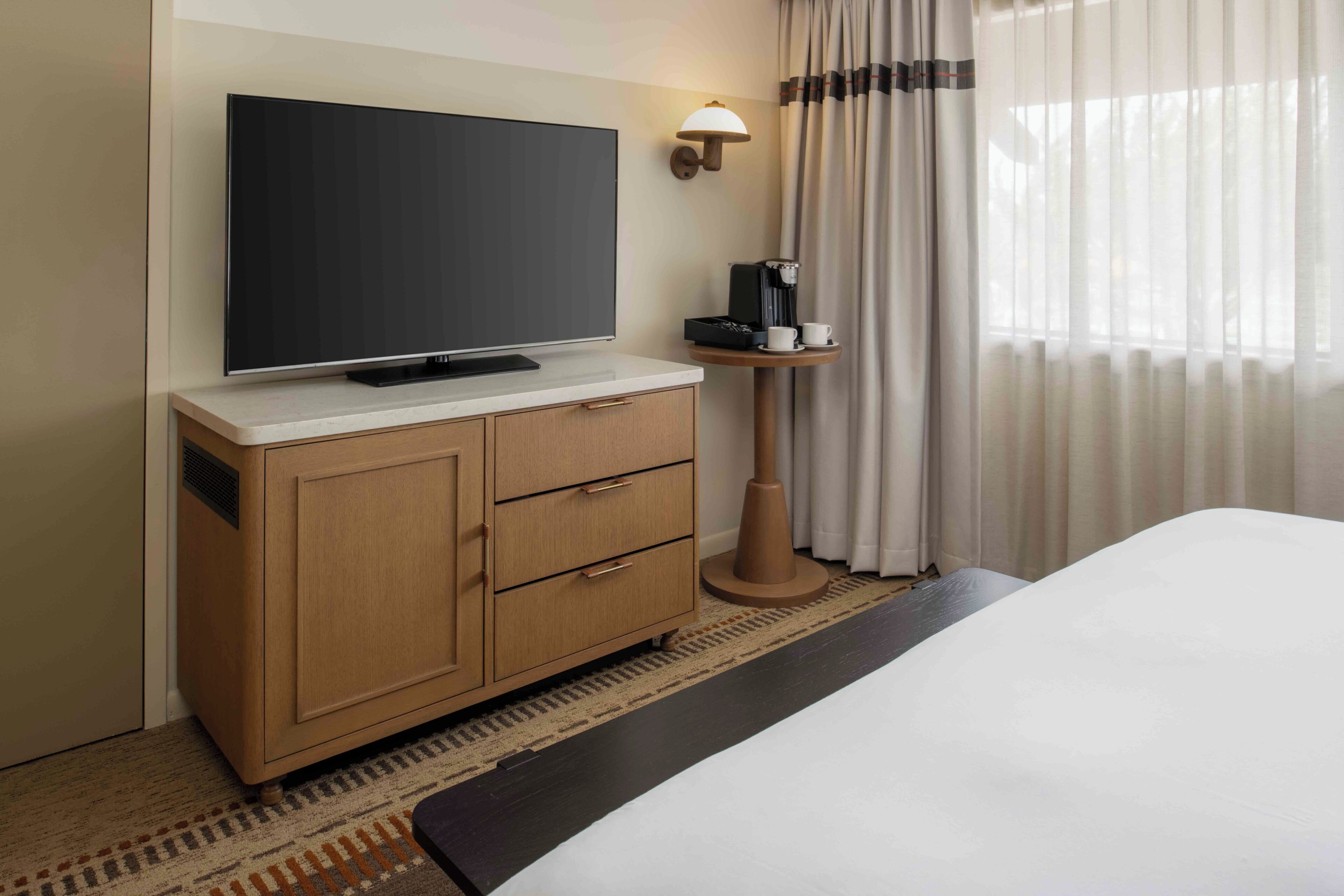 Roupas de cama premium, edredons de pluma, cofres nos quartos
