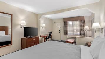 Quarto Standard, 1 cama king-size, fumadores | Ferro/tábua de engomar, Wi-fi grátis, roupa de cama fornecida