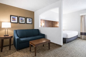 Suíte luxo, para não fumantes | Escrivaninha, cortinas blackout, ferros/tábuas de passar roupa