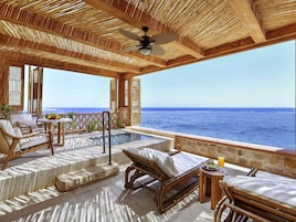 Suíte júnior, 1 cama Queen, vista para o mar | Vista do quarto