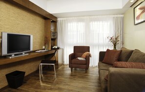 Suíte | Sala de estar | TV LCD 42 polegadas com canais a cabo, TV