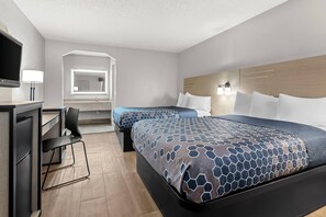 Camas com colchões pillow-top, individualmente decorados