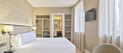 Quarto Duplo Deluxe | Minibar, cofre no quarto, cortinas/cortinados opacos, Wi-fi grátis
