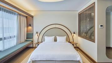 Quarto Duplo Superior | Roupa hipoalergénica, minibar, cofre no quarto, secretária