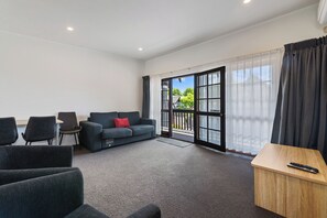 Apartamento, 2 quartos | Ferros/tábuas de passar roupa, Wi-Fi de cortesia, roupa de cama