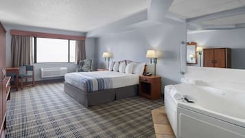 Suite, 1 cama king-size, não fumadores | Secretária, cortinas/cortinados opacos, ferro/tábua de engomar