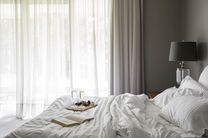 Roupa hipoalergénica, camas de colchão pillowtop, minibar 