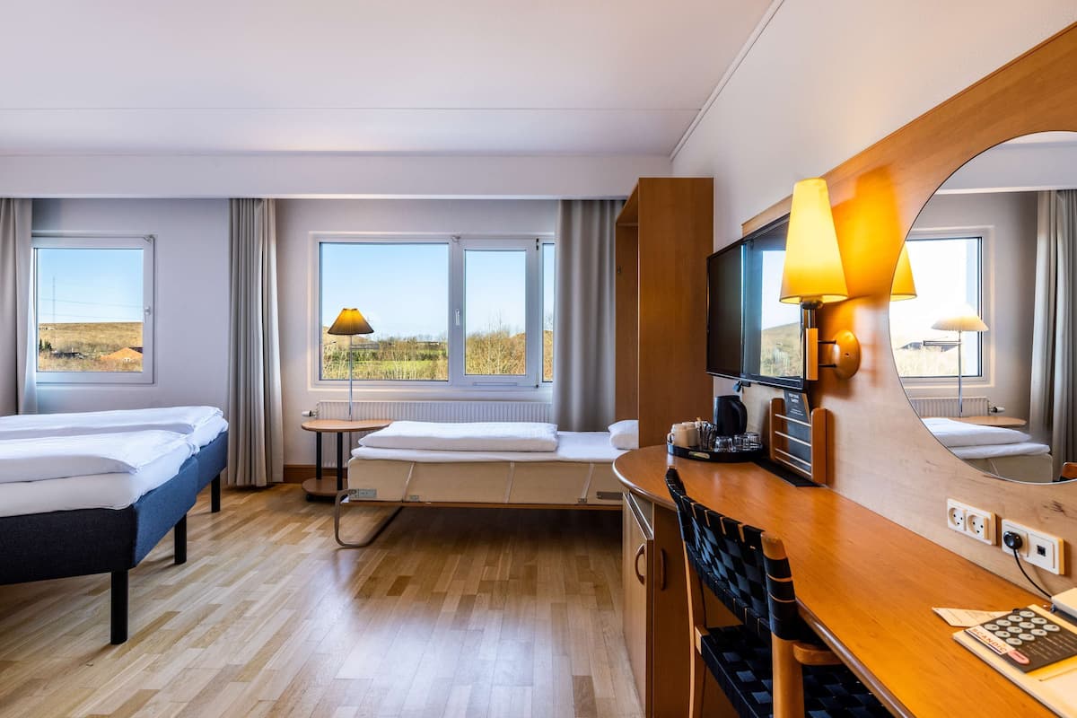 Cortinas blackout, quartos à prova de som, Wi-Fi de cortesia