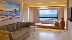 Suite Acqua | Área de estar | TV de tela plana 32 polegadas com canais a cabo, TV