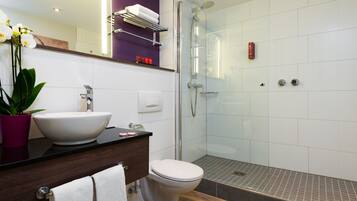Conforto | Casa de banho | Um polibã, um secador de cabelo, toalhas fornecidas