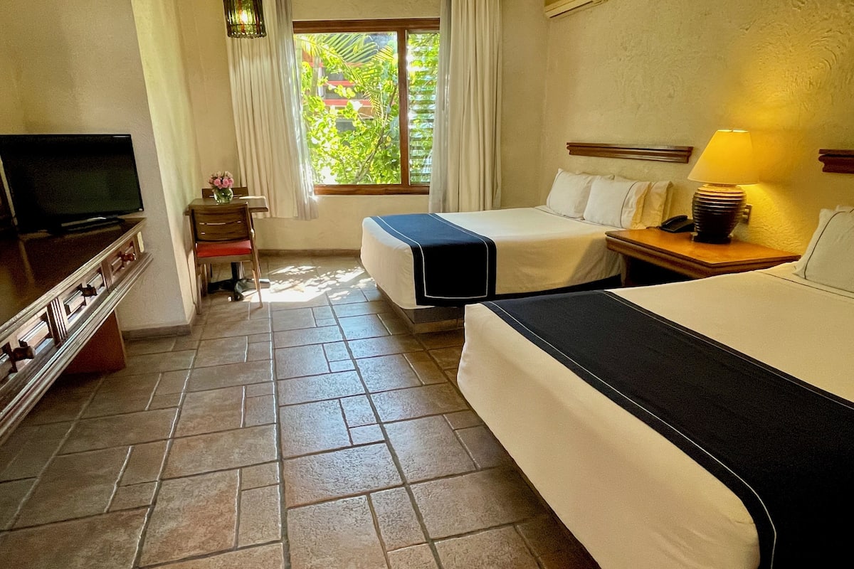 Roupas de cama premium, cofres nos quartos, individualmente decorados