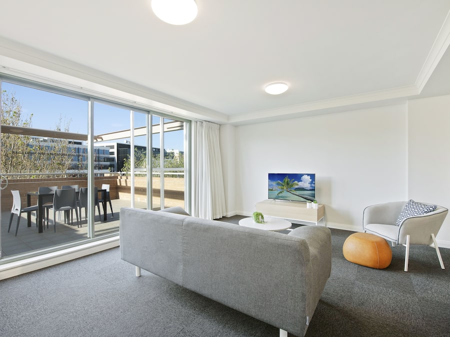 Apartamento, 1 quarto | Área de estar | TV de tela plana 43 polegadas com canais digitais