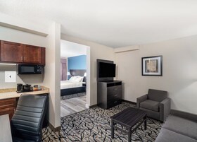 Suite-Estúdio, 1 cama king-size, não fumadores | Com mobília individualizada, secretária, cortinas/cortinados opacos 