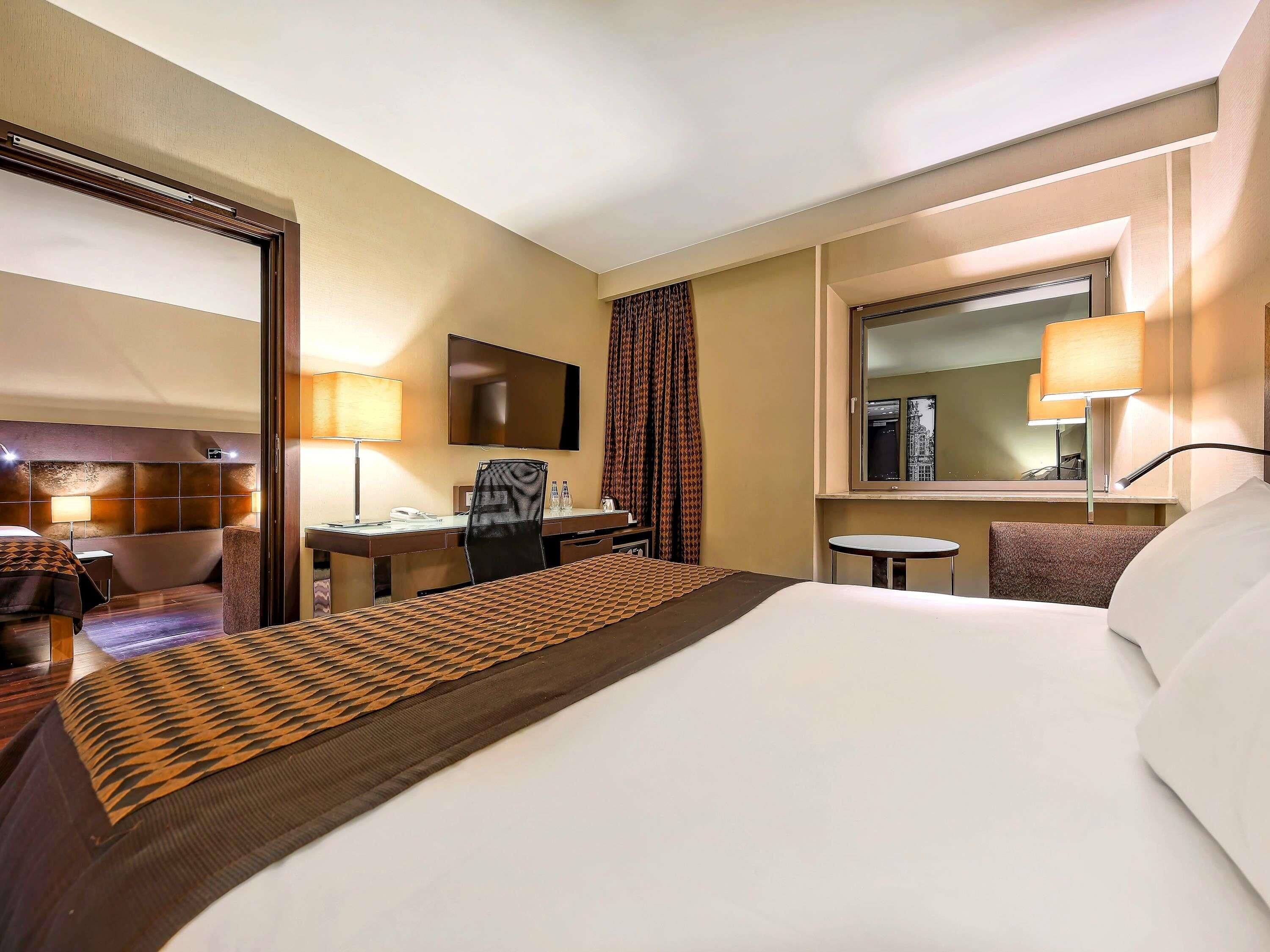 Apartamento Familiar, várias camas, quartos comunicantes (Comfortable) | 1 quarto, minibar, cofre com capacidade para portátil 
