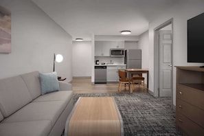 Um frigorífico, um micro-ondas, uma placa de cozinha 