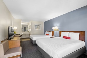 Quarto Deluxe, 2 camas queen-size | Secretária, Wi-fi grátis, roupa de cama fornecida