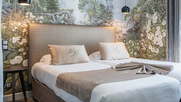 Quarto duplo, vista para o jardim | Frigobar, cofres nos quartos, escrivaninha, quartos à prova de som