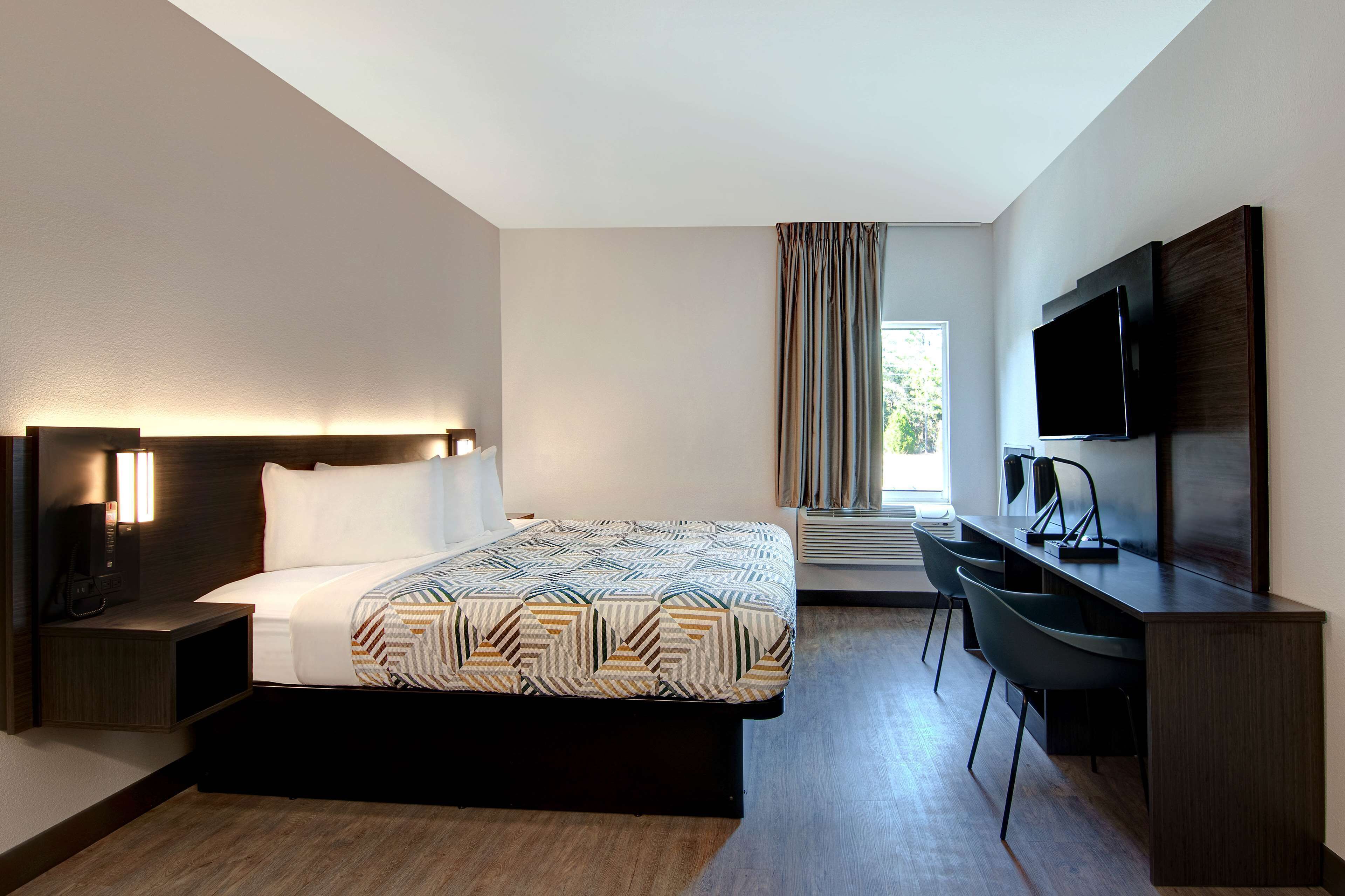 Secretária, secretária adequada para computadores portáteis 