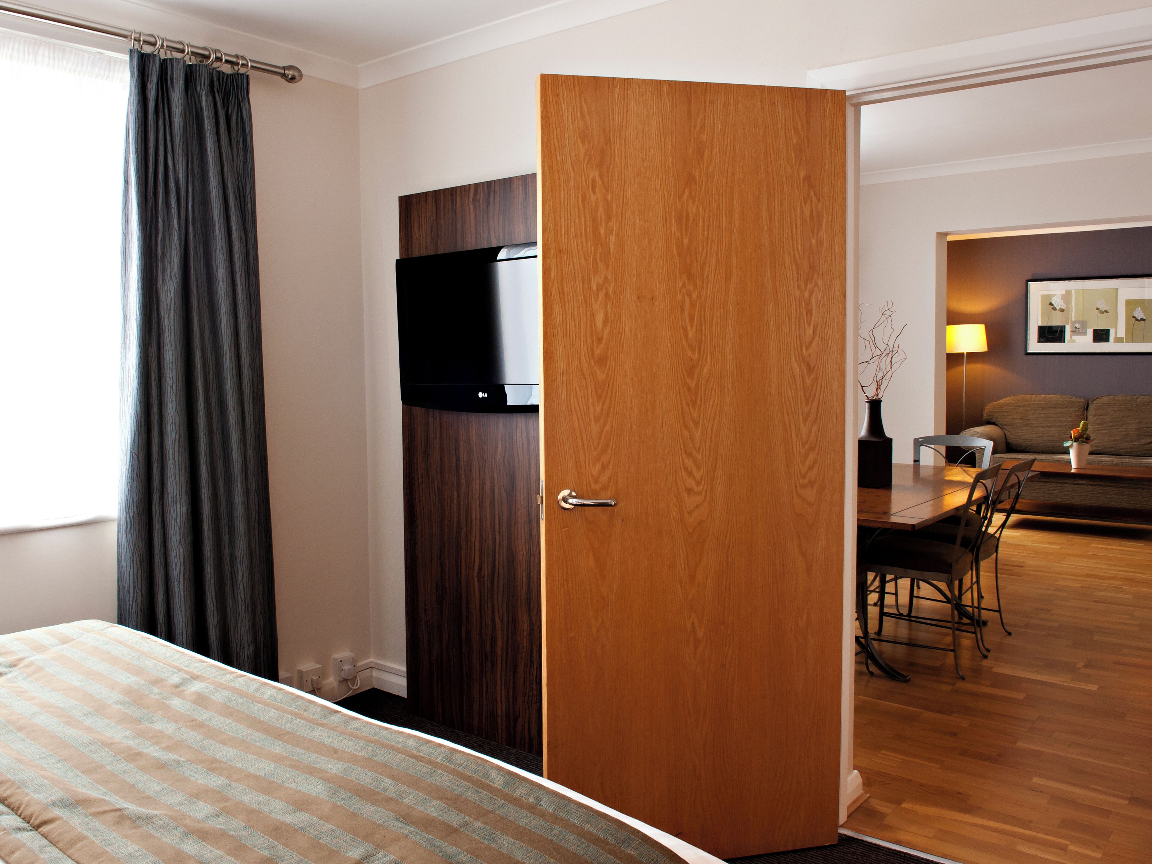 Suíte, 1 quarto, vista para a cidade (Super King) | 20 quartos, roupas de cama premium, escrivaninha