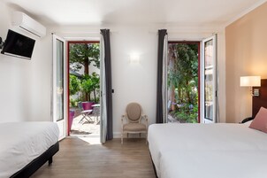 Quarto Triplo Deluxe | Cofre no quarto, quartos insonorizados, Wi-fi grátis 