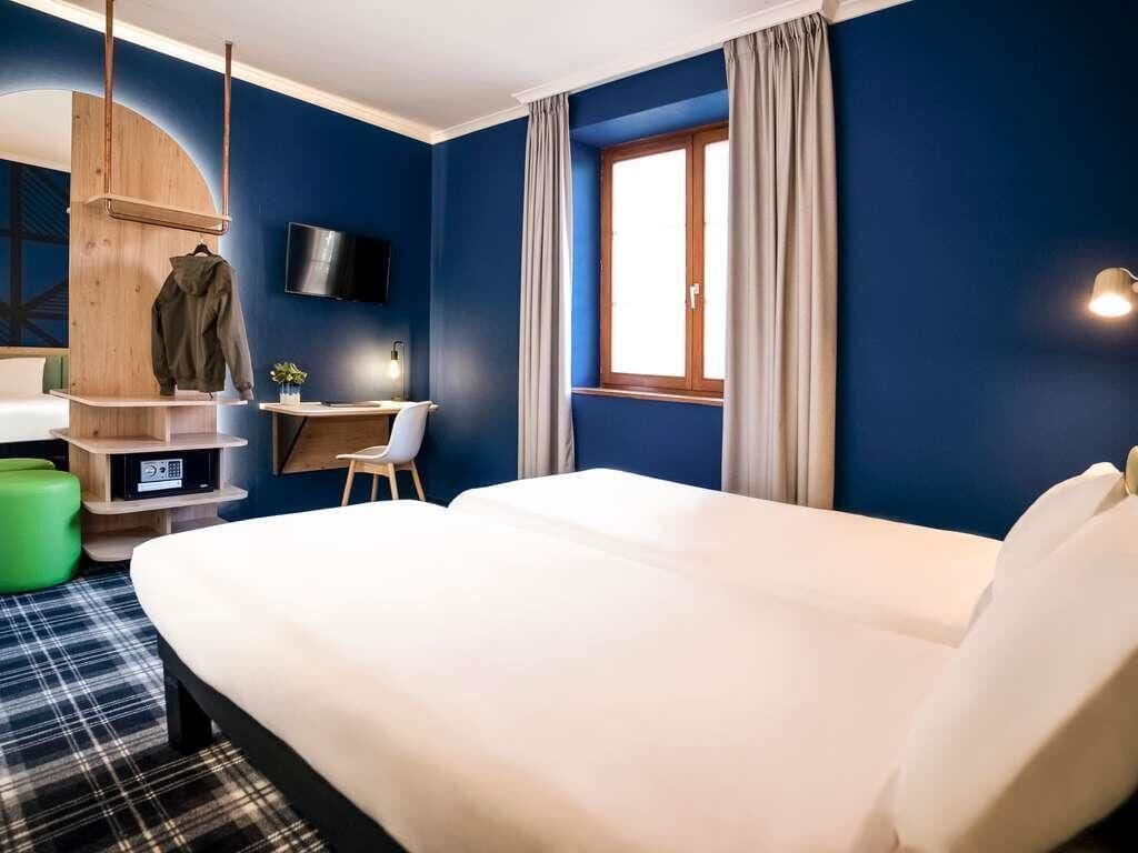 Quarto standard, 2 camas de solteiro | Frigobar, cofres nos quartos, escrivaninha, quartos à prova de som