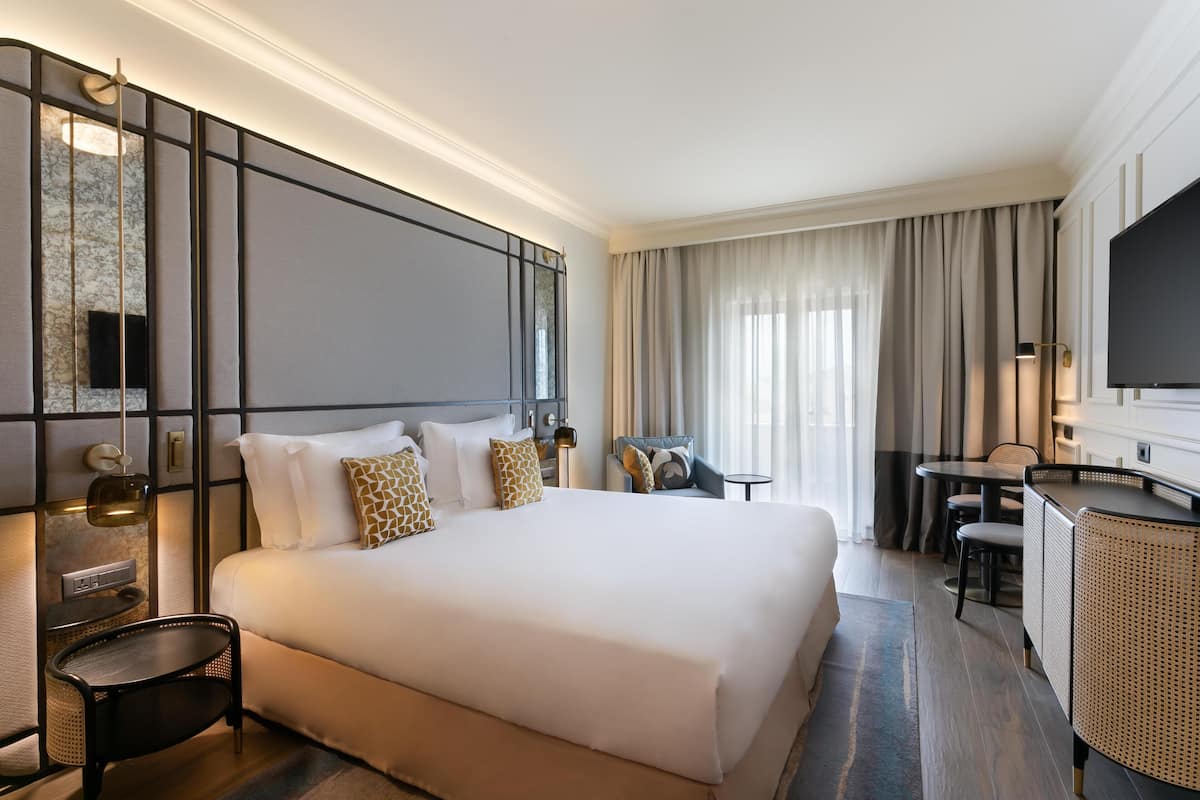Suite Deluxe | 1 quarto, roupa hipoalergénica, minibar, cofre no quarto 