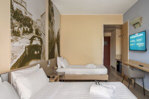 Quarto triplo standard | 1 quarto, edredons de pluma, frigobar, cofres nos quartos