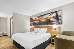 Quarto standard, 1 cama King, acessível | Escrivaninha, cortinas blackout, berços grátis