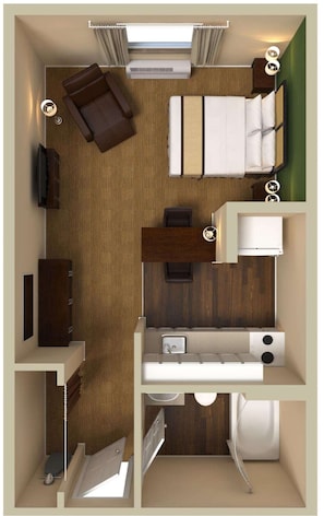 Quarto de hotel compacto com cama, escrivaninha, pequena cozinha, banheiro e área de estar com cadeira e mesa.