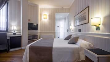 Roupas de cama premium, edredons de pluma, frigobar, cofres nos quartos