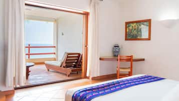 Linda Vista Suite Frente al Mar, 1 cama extragrande | Cofre com capacidade para portátil, berços/camas para crianças grátis