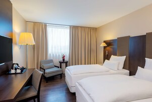 Roupa hipoalergénica, camas de colchão pillowtop, minibar 