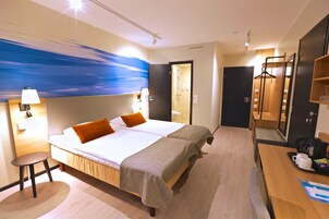 Escrivaninha, cortinas blackout, Wi-Fi de cortesia, roupa de cama