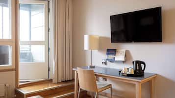 Quarto superior, 1 cama King | Escrivaninha, cortinas blackout, berços grátis, Wi-Fi de cortesia