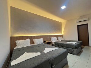 Quarto standard, vista para o jardim | Frigobar (abastecido com itens grátis), cofres nos quartos