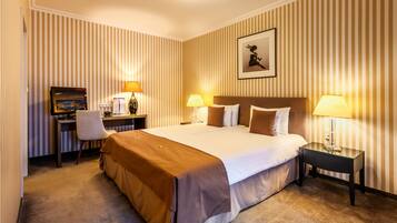 Quarto superior | Frigobar, cofres nos quartos, escrivaninha