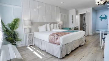 Suíte empresarial, 1 cama King | Ferros/tábuas de passar roupa, Wi-Fi de cortesia, roupa de cama