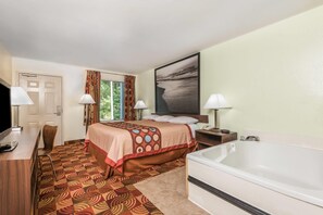 Suite-Estúdio Deluxe, 1 cama king-size, não fumadores | Secretária, cortinas/cortinados opacos, ferro/tábua de engomar 