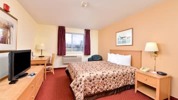 Quarto, 1 cama king-size, acessível, não fumadores | Cofre no quarto, secretária, ferro/tábua de engomar, camas desdobráveis