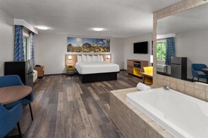 Suíte, 1 cama King, para não fumantes | Banheira de hidromassagem