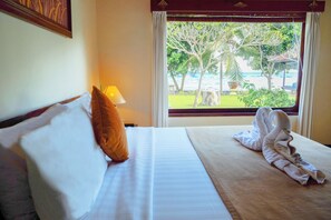 Deluxe Beach Front Villa | Minibar, cofre no quarto, secretária, ferro/tábua de engomar 