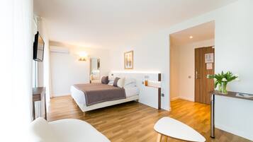 Quarto luxo, vista para a cidade | Frigobar, cofres nos quartos, cortinas blackout, quartos à prova de som